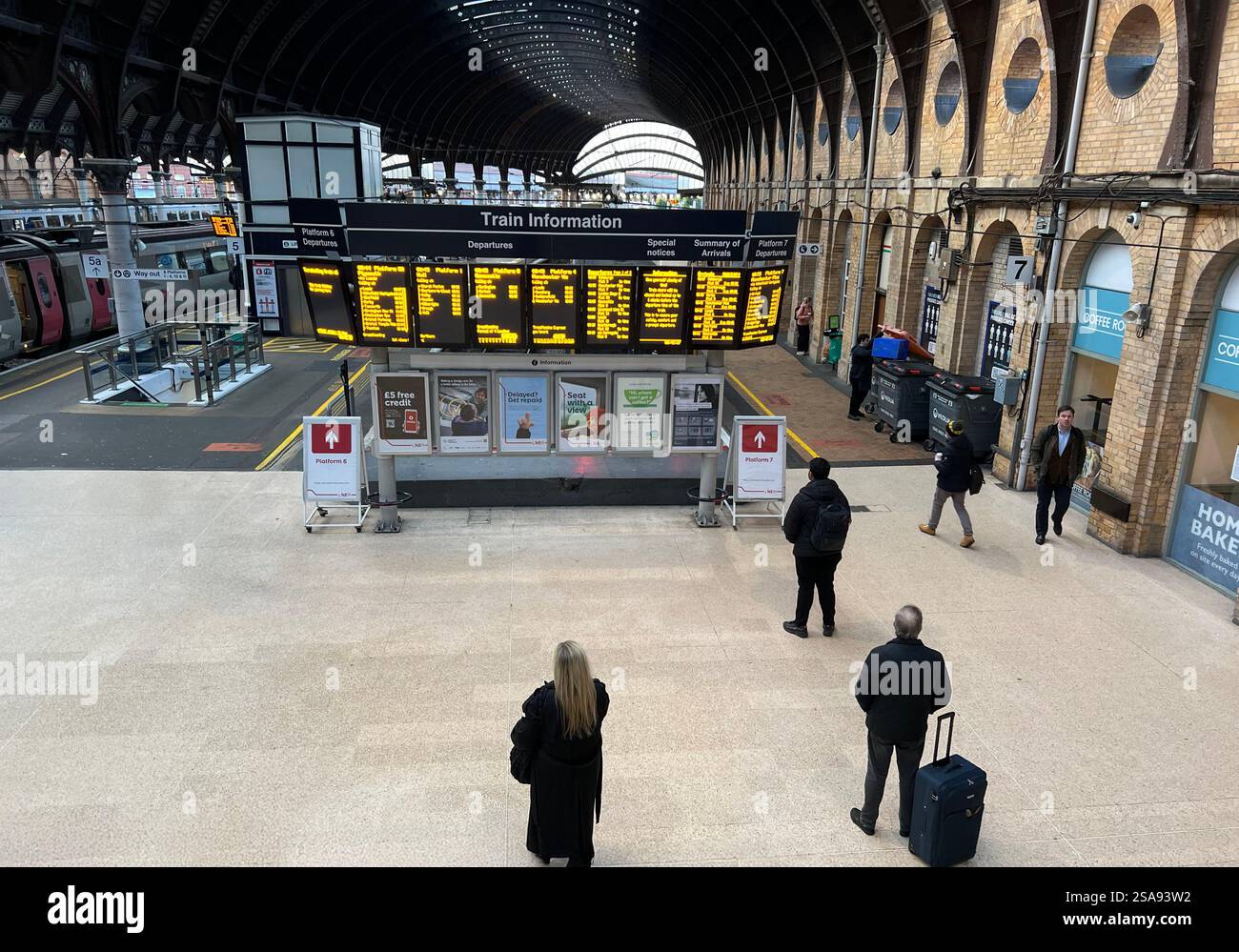 Uk Railway Network - passengers waiting for an LNER train at York ...