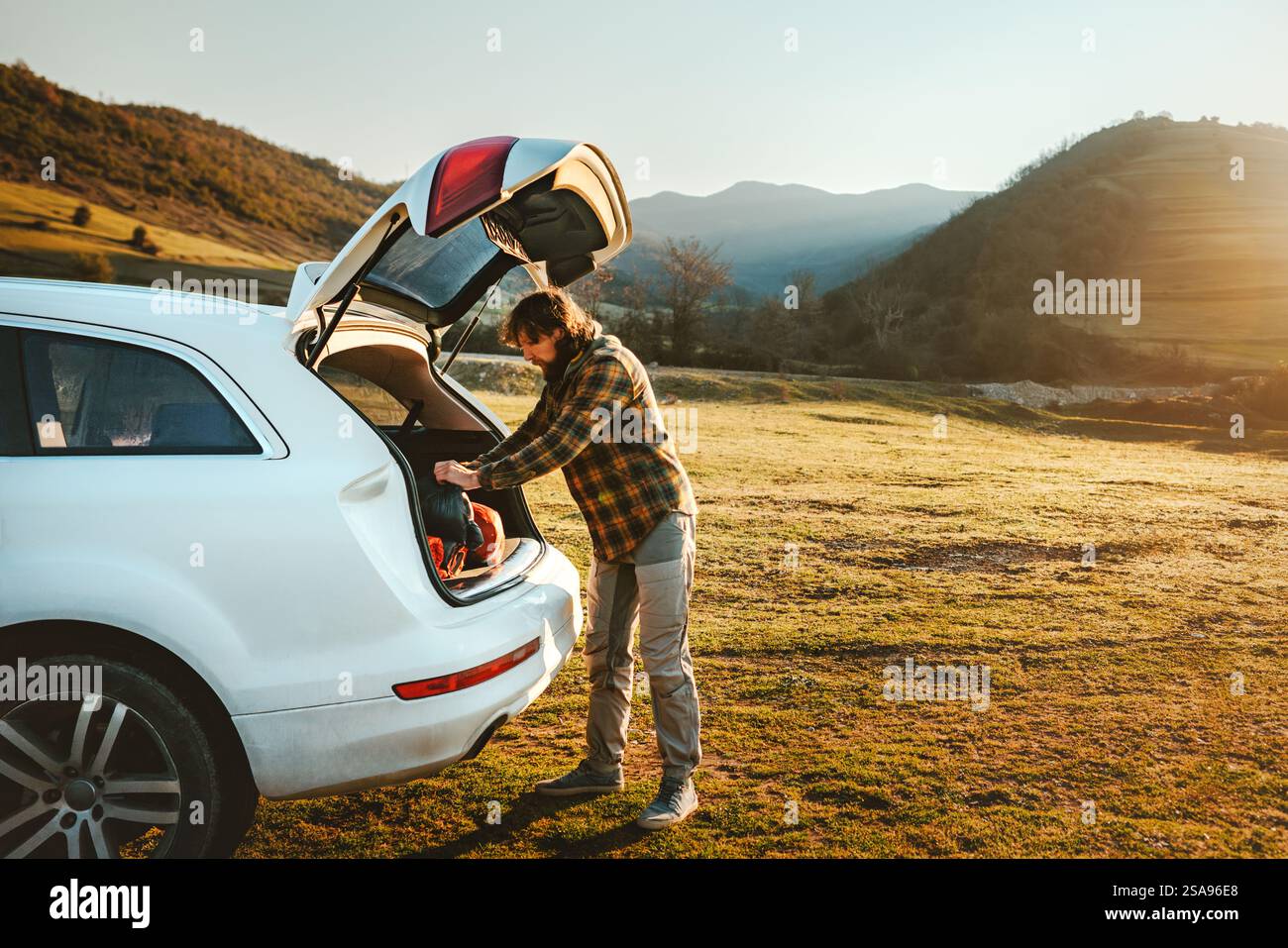 Road trip vacations - man traveling by rental car active lifestyle ...