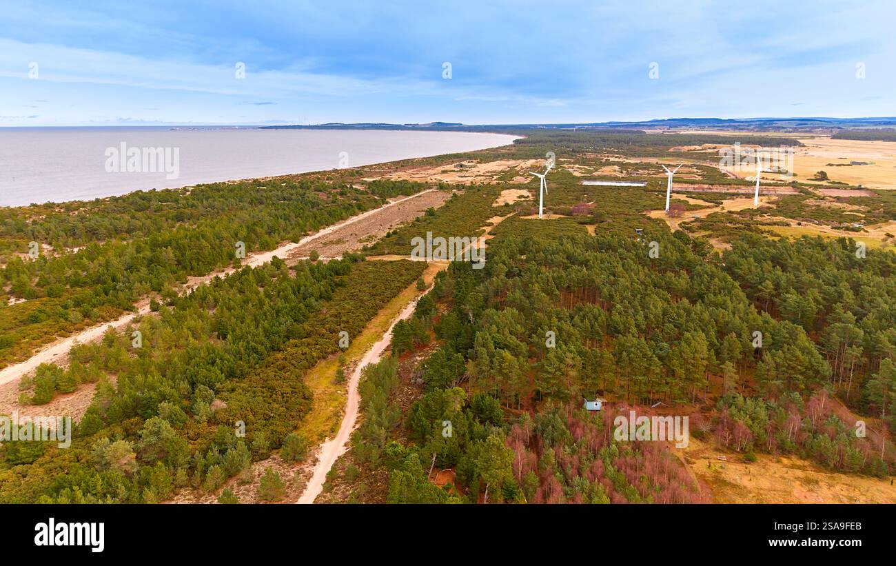 Findhorn Foundation Ecovillage Moray Scotland looking across pine trees ...