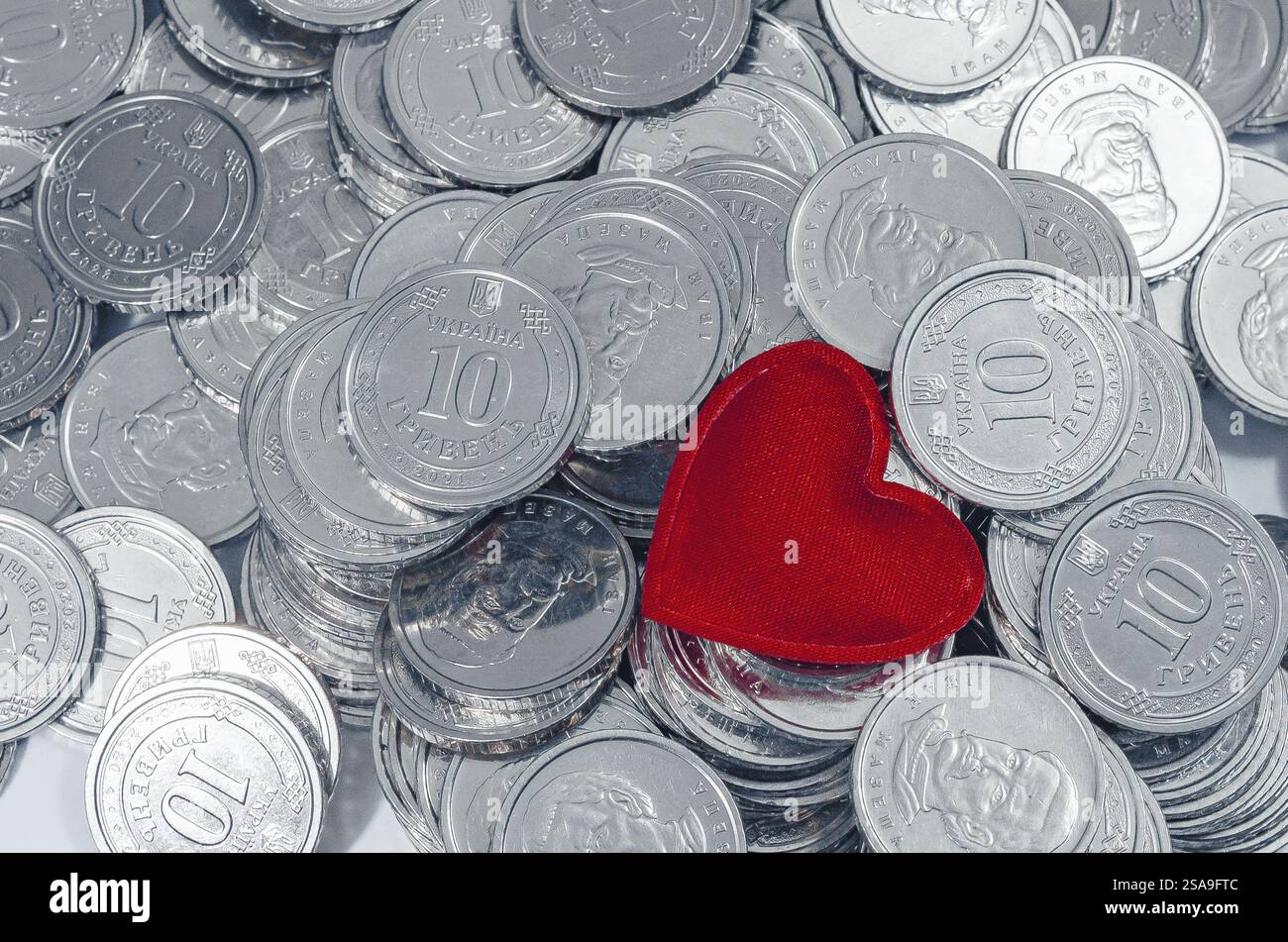 Coins red heart background. Valentine's day concept. Minimal concept ...