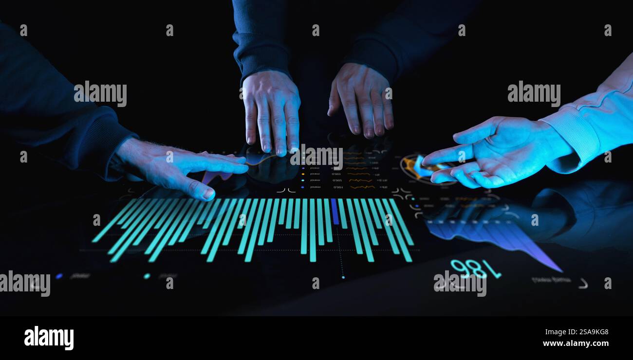 Three individuals in formal attire engaging with advanced touch screen ...