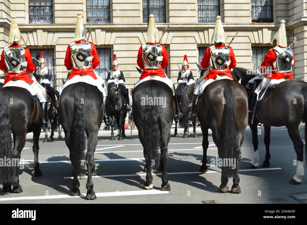 Back view soldiers & horses of red Life Guards regiment Changing Guard ...