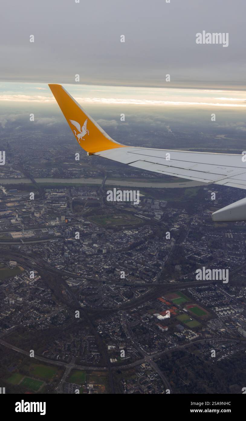 Aerial view of Düsseldorf with Pegasus Airlines wingtip. The industrial ...