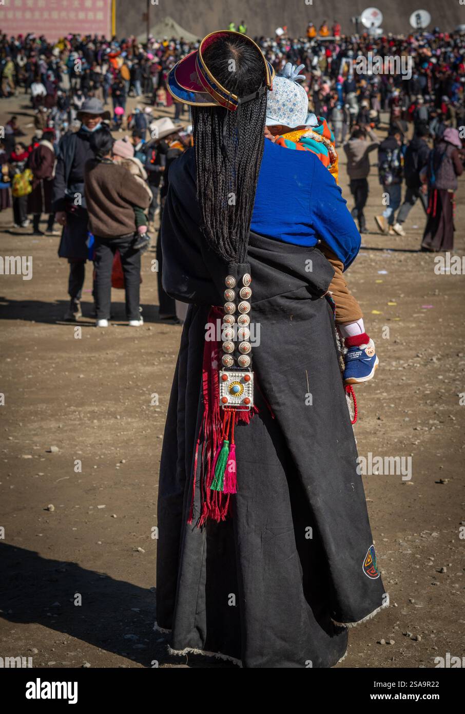 Mt Kailas, Tibet. May 23, 2024. A Tibetan woman wearing her most ...