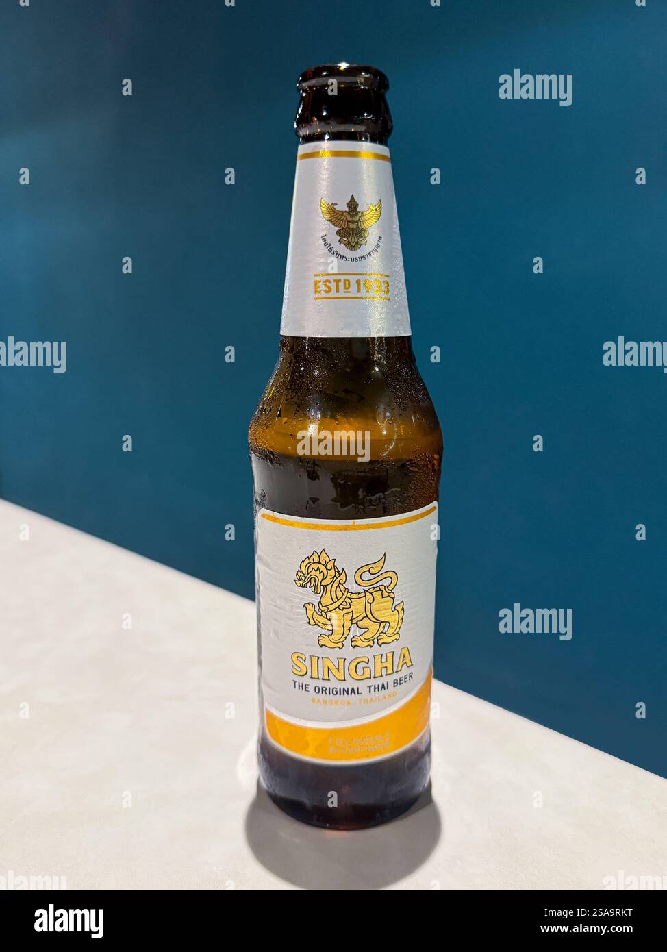 Krabi, Thailand - 4th April, 2024 : A chilled pint sized bottle of ...