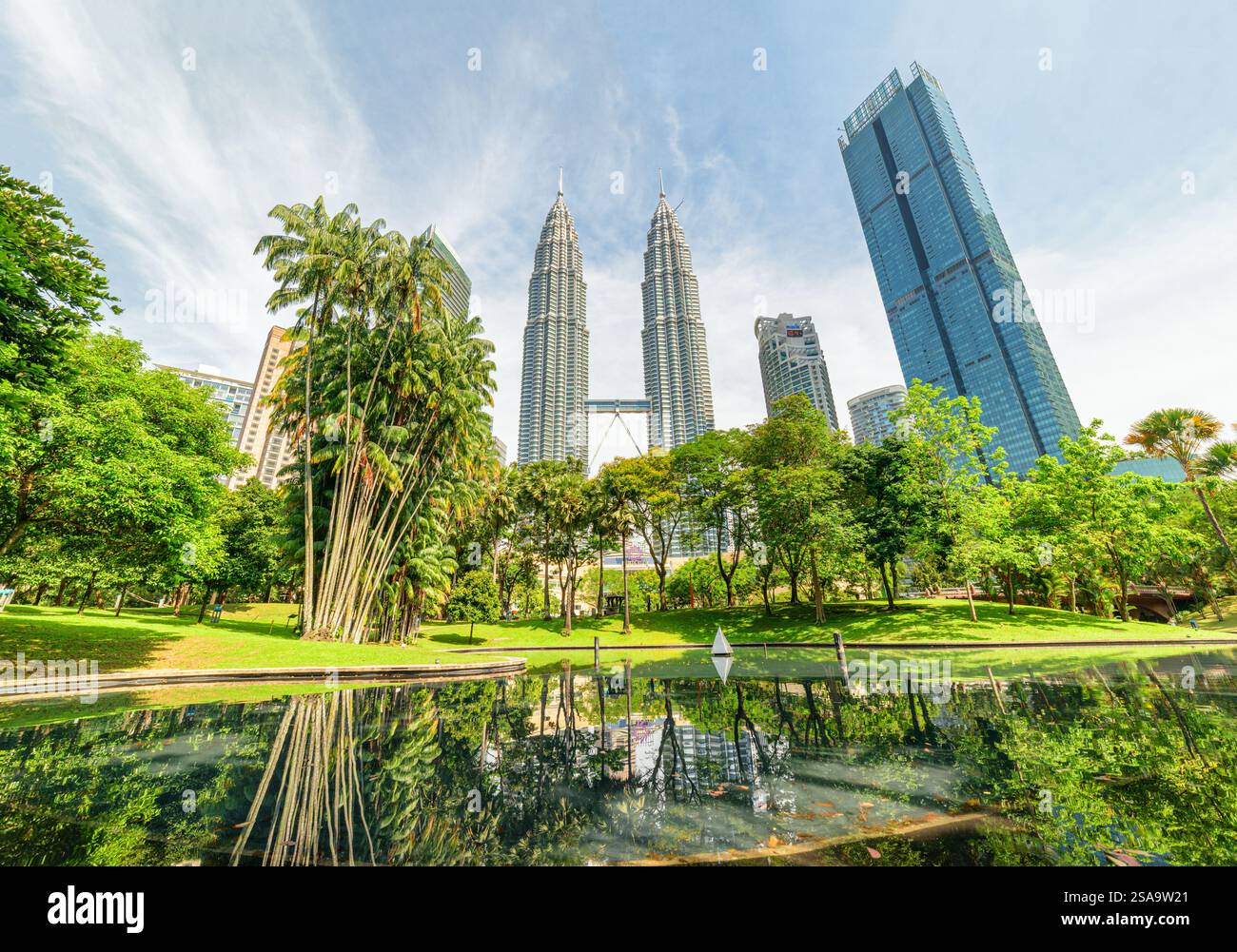 Scenic artificial lake at the KLCC Park and skyscrapers Stock Photo - Alamy
