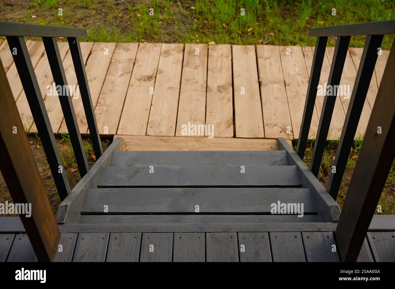 Entrance staircase of a traditional wooden house. Detail of a wooden ...