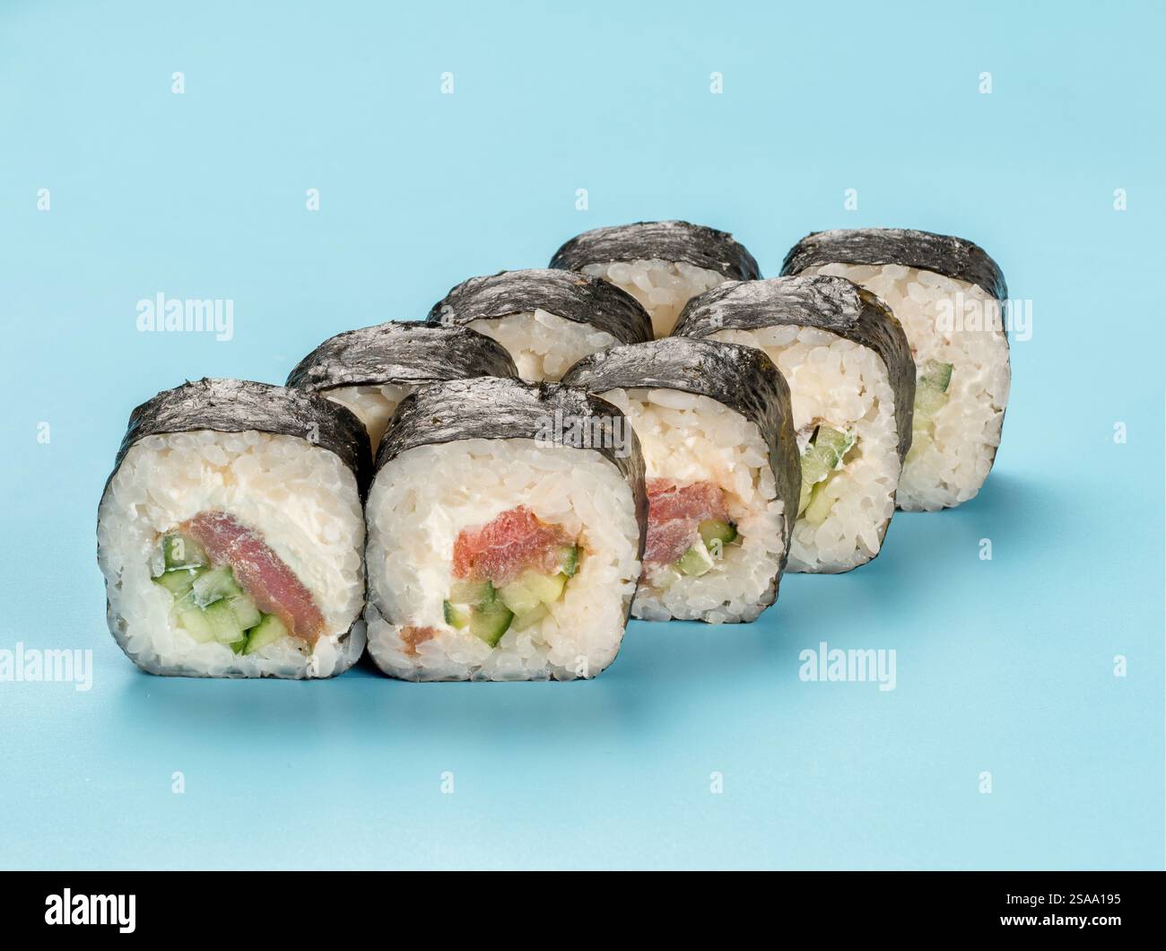Studio photography of Maki roll with cucumber and tuna wrapped in nori ...