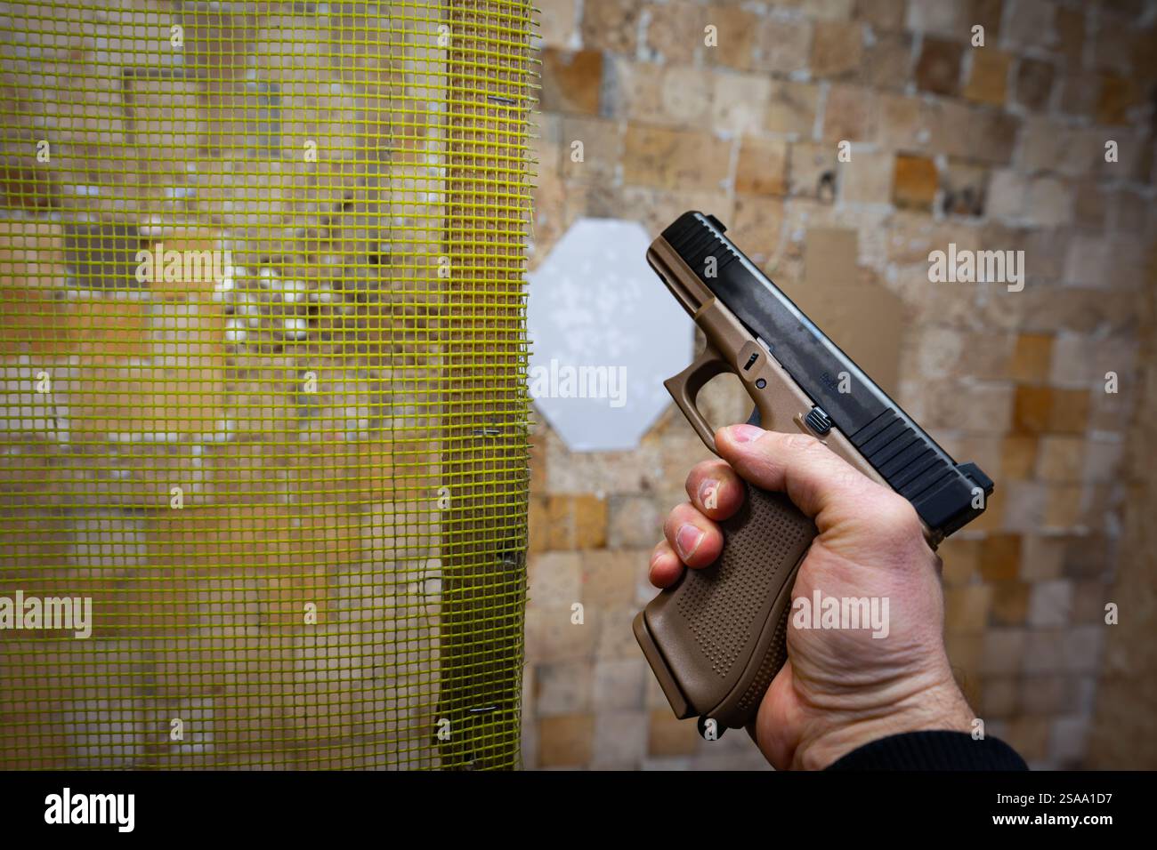Pistol shooting training at a target from behind cover in a shooting ...