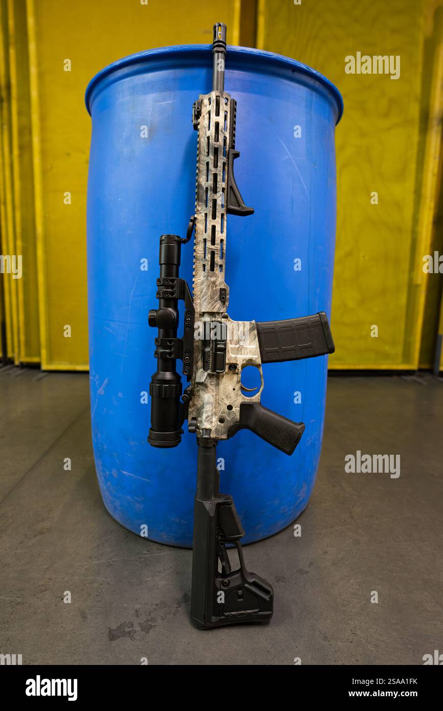 Very cool tactical sports rifle with optical sight in shooting range ...