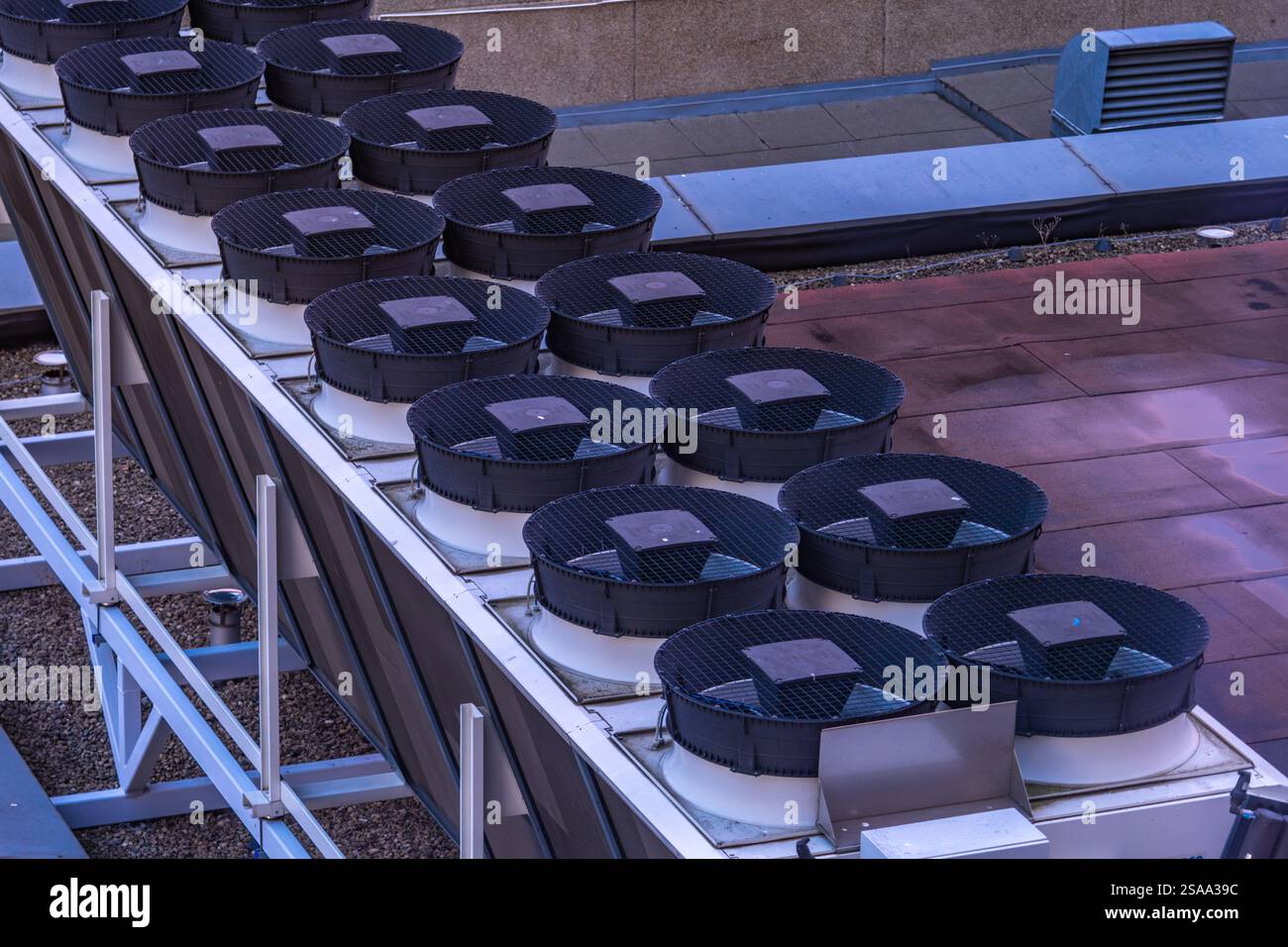 Industrial air conditioners on the factory roof, engine fans, air ...