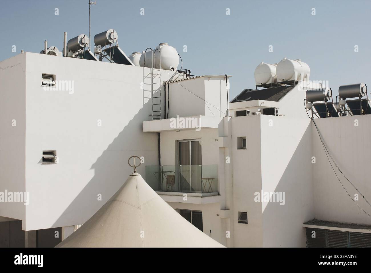 Water tanks on hotel roof in Ayia Napa Stock Photo - Alamy