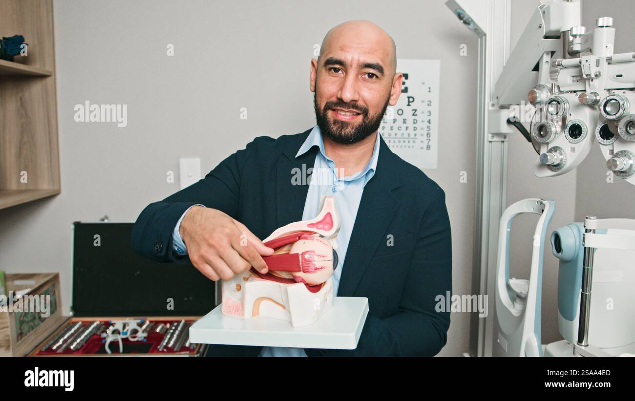 Optometrist Presenting an Eye Anatomy Model in a Clinic Setting Stock ...