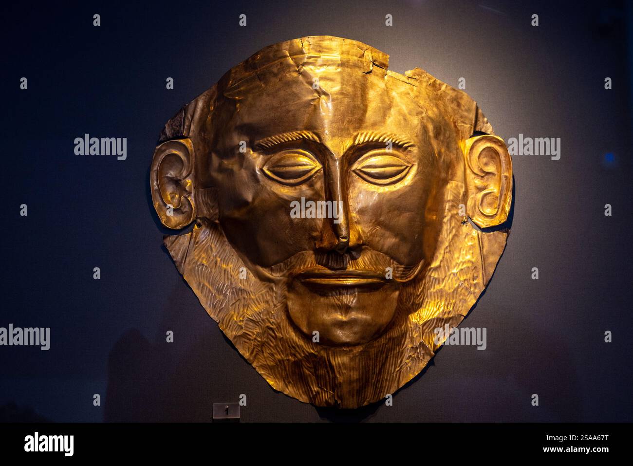 The Mask of Agamemnon, a gold funeral mask exhibited in the National ...