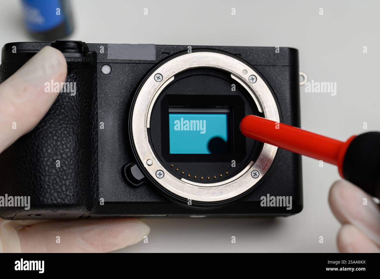 Cleaning the camera sensor with a blower for office equipment and electronics from contamination ...