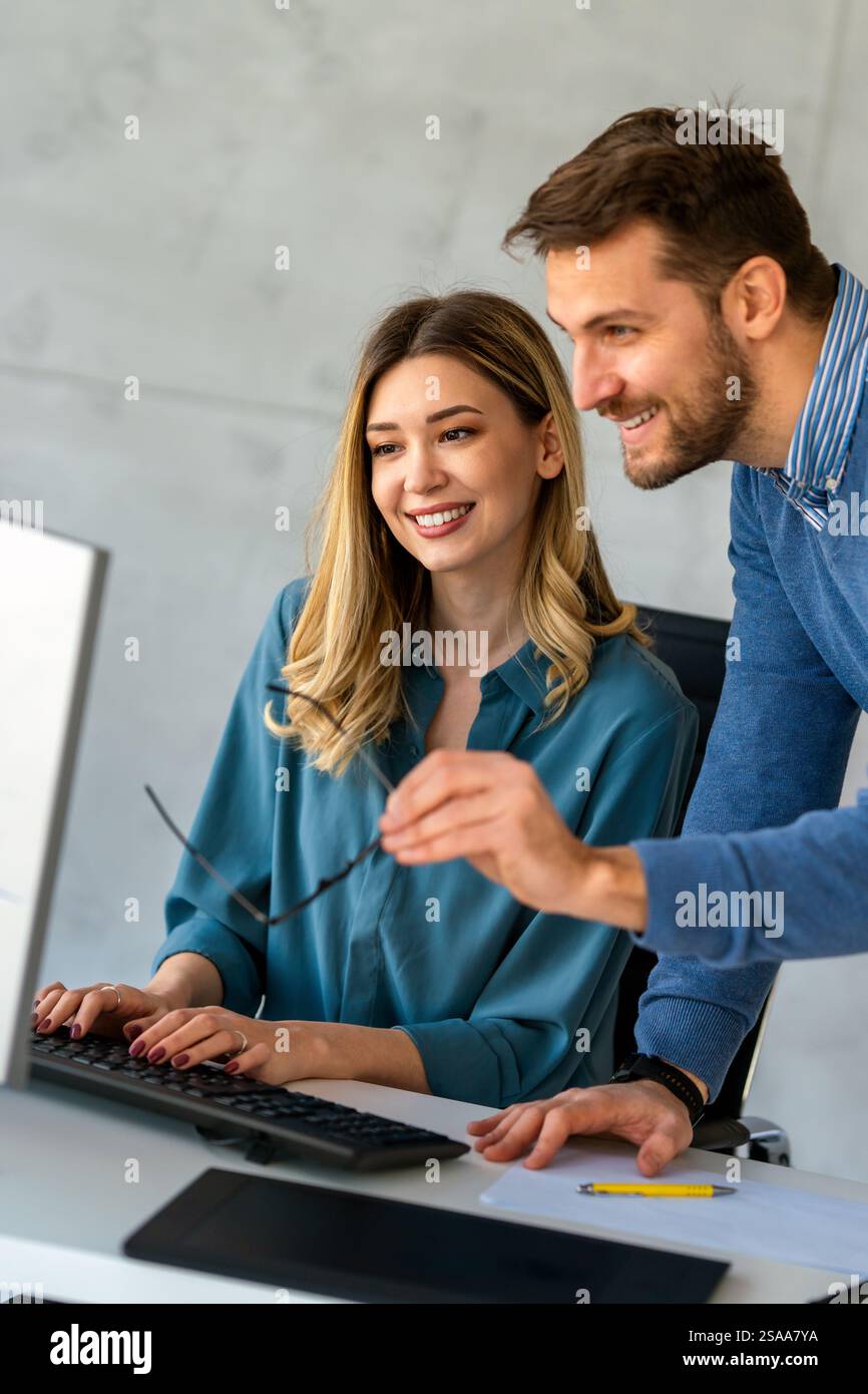 Mixed team of software engineers brainstorming ideas. Diverse app developers collaborating as ...