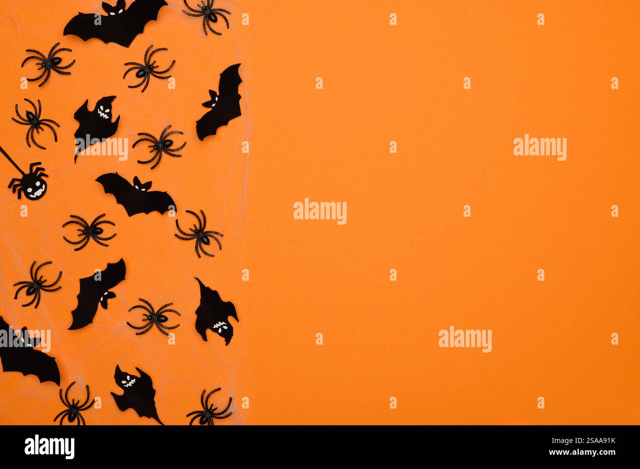 Halloween layout: black spiders, bats, ghosts on an orange background ...