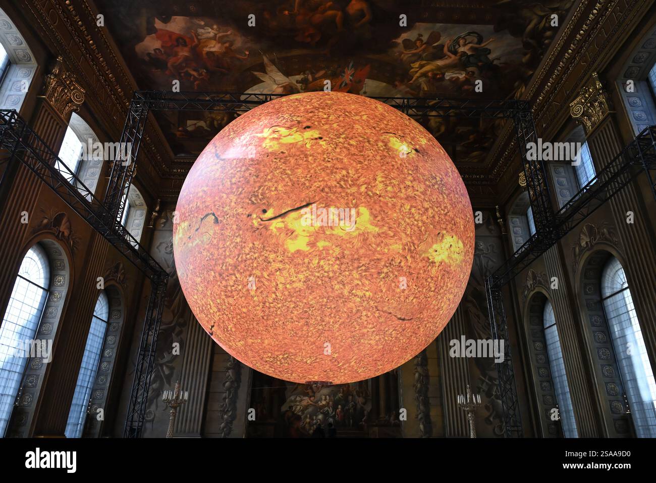 Helios art installation by Luke Jerram inside the Painted Hall of the ...