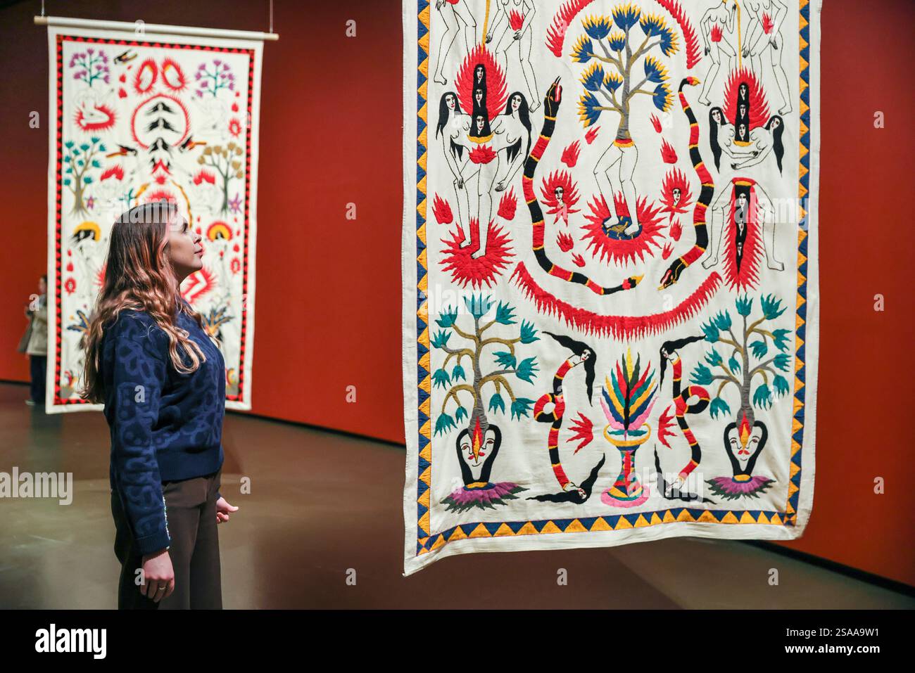 London, UK. 29th Jan, 2025. Exhibition staff and members of the press with 'Act Three', 2024 ...