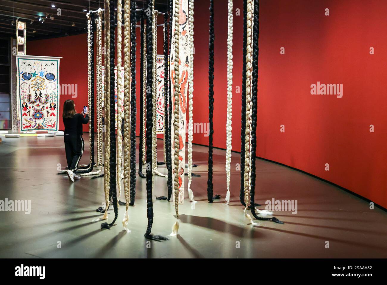 London, UK. 29th Jan, 2025. Exhibition staff and members of the press with 'Act Two', 2024 ...