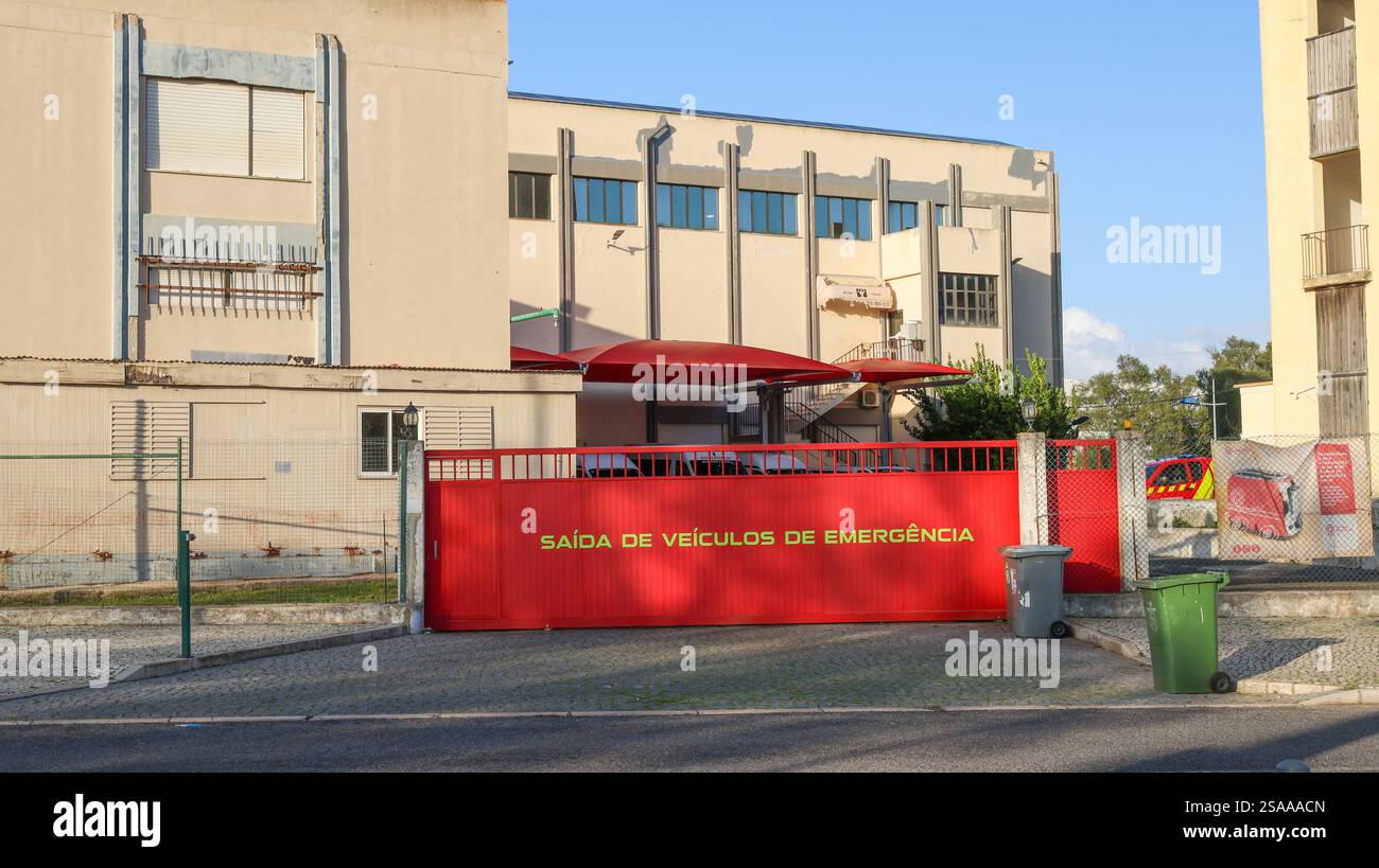 Red sliding gate with the inscription emergency vehicle exit in ...
