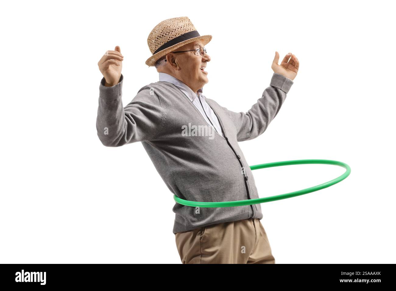 Elderly gentleman spinning a hula hoop isolated on white background ...