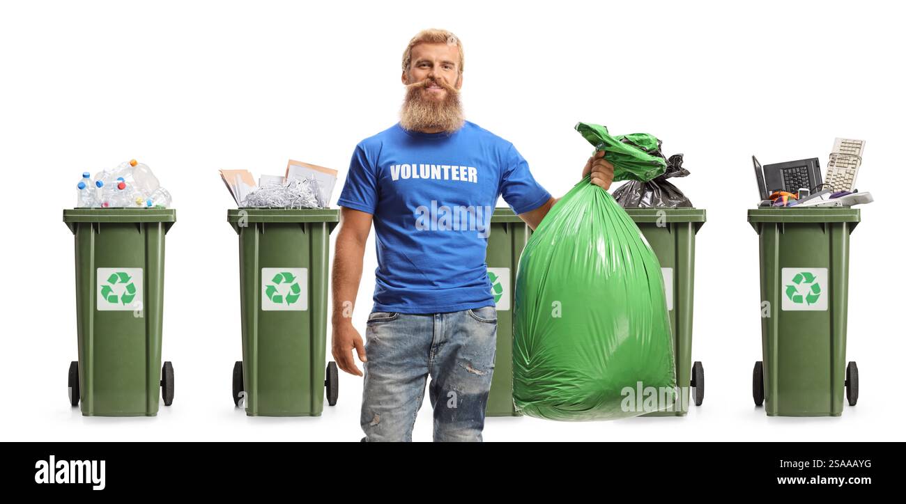 Male volunteer holding a green plastic waste bag with recycling ...