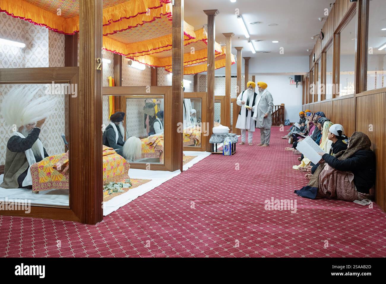 At a morning service 4 Sikh priests read the entirety of their bible ...