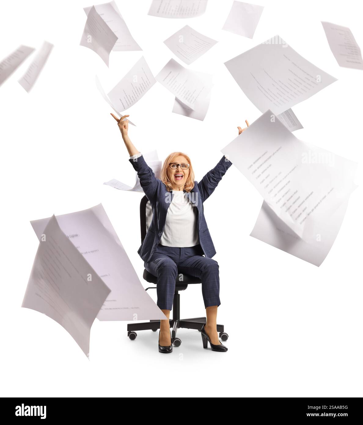 Middle aged woman sitting in an office chair and throwing paper ...