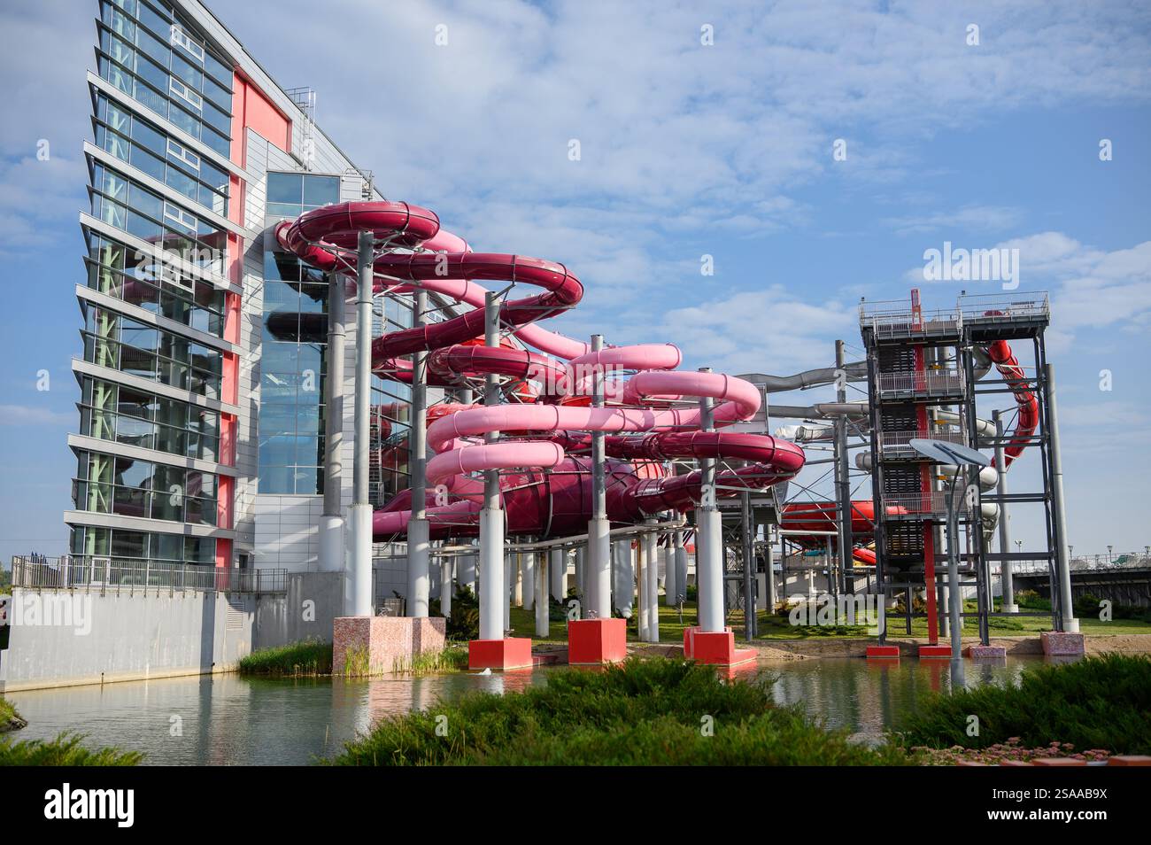 An entertaining water park complex with bright high, different levels ...