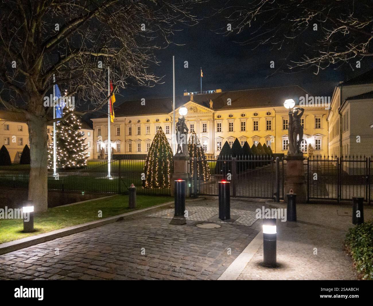 View of the illuminated Bellevue Palace at night in Berlin, winter 2021 ...
