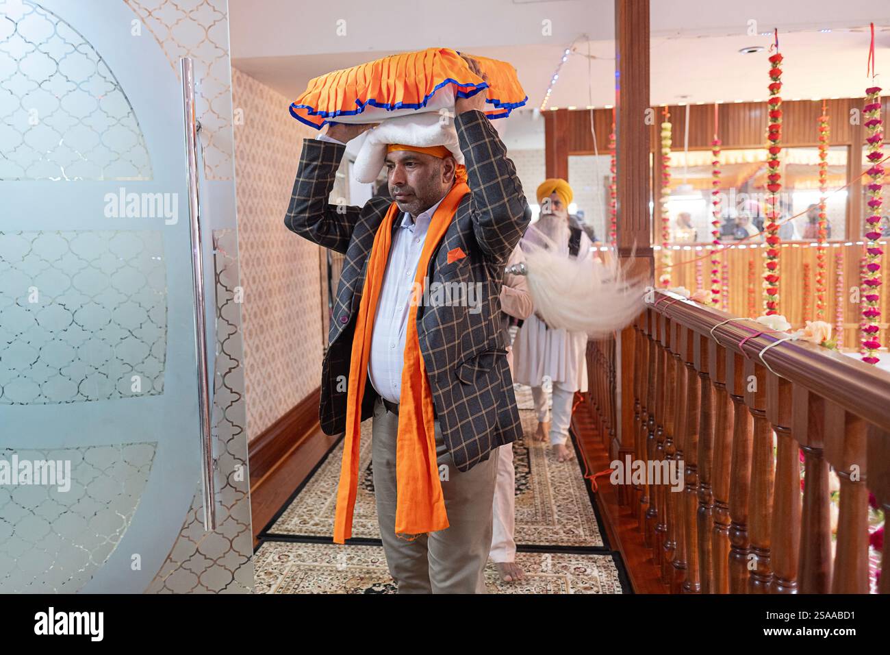 After a morning service where the entire Sikh bible is read worshippers ...