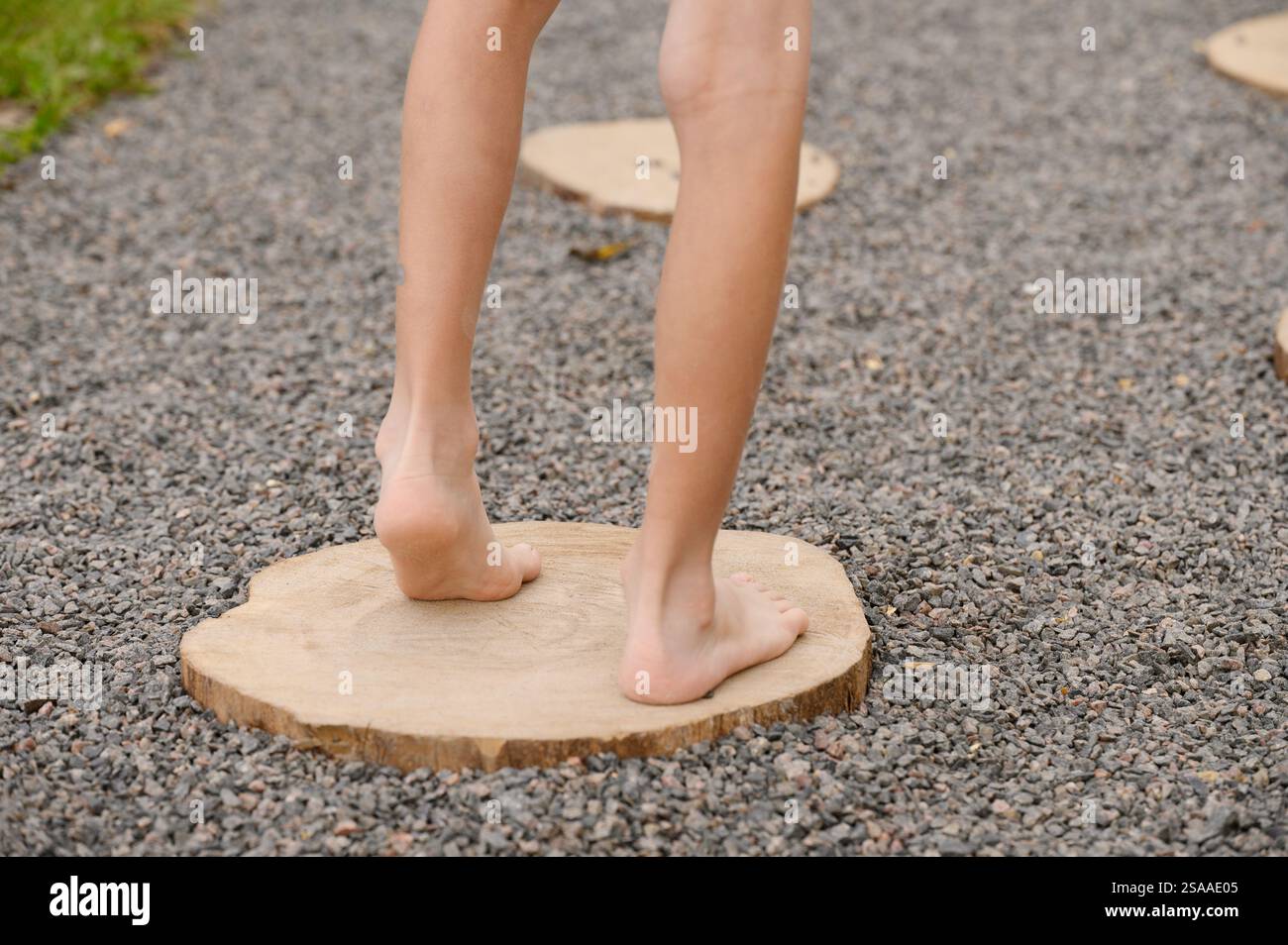 Path of health. The child walks along a sensory path with different ...