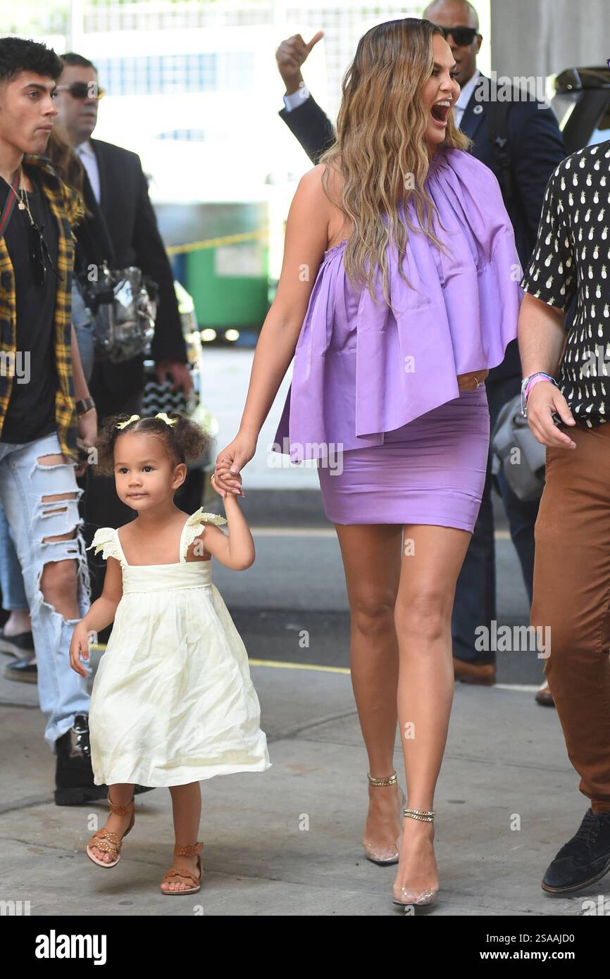 Luna Simone Stephens and Chrissy Teigen at Pier 92 in midtown on June 23, 2019 in New York City ...