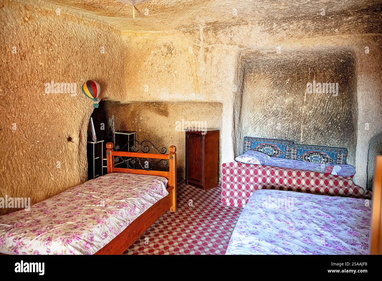 Unique cave dwelling with cozy bedding in Cappadocia's magical ...