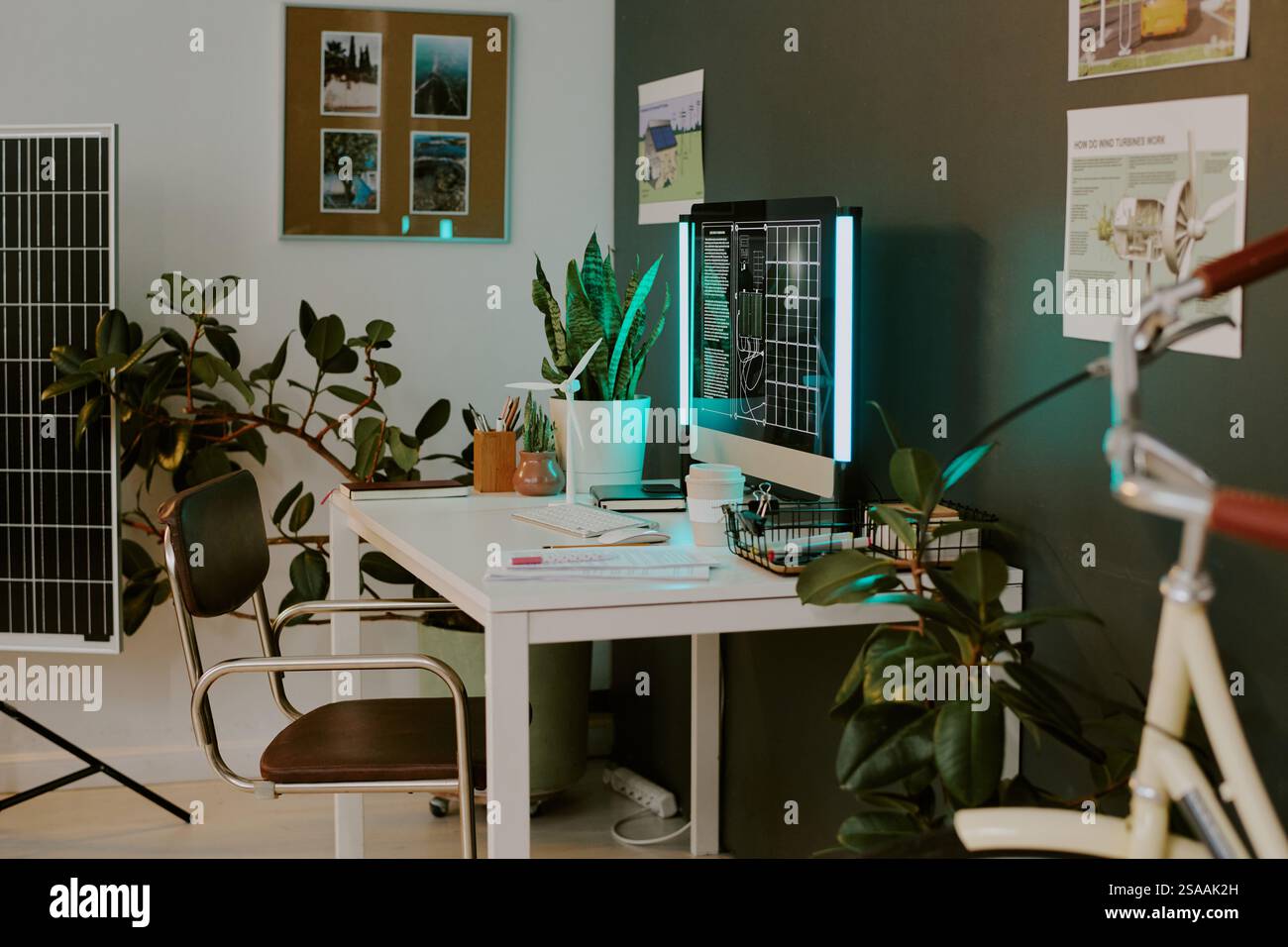 Modern office setup featuring solar panel analysis with tech gadgets ...