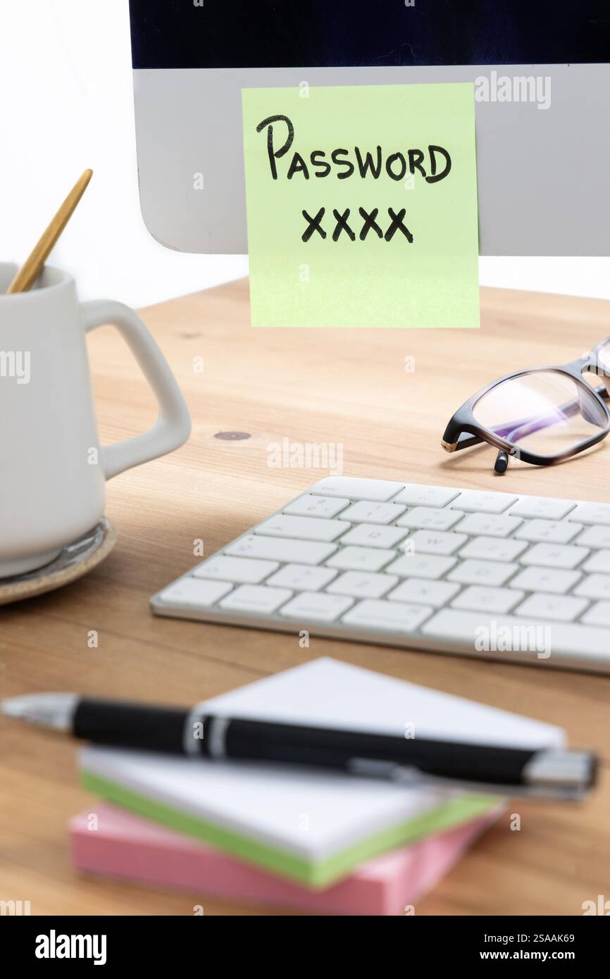 A close-up image of a sticky note attached to a computer screen with a ...