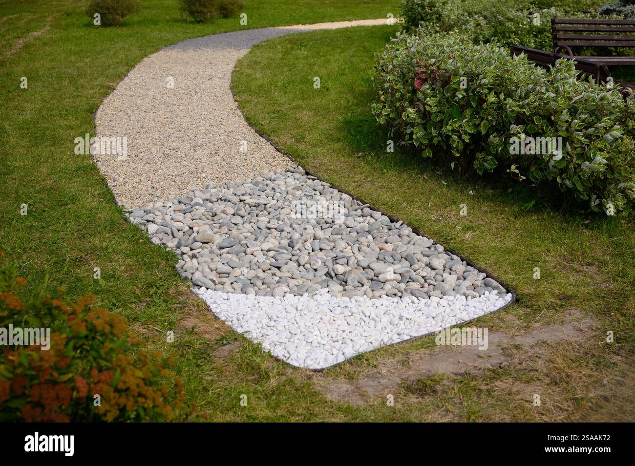 Tactile massage eco-trail with different textures in park for walking ...