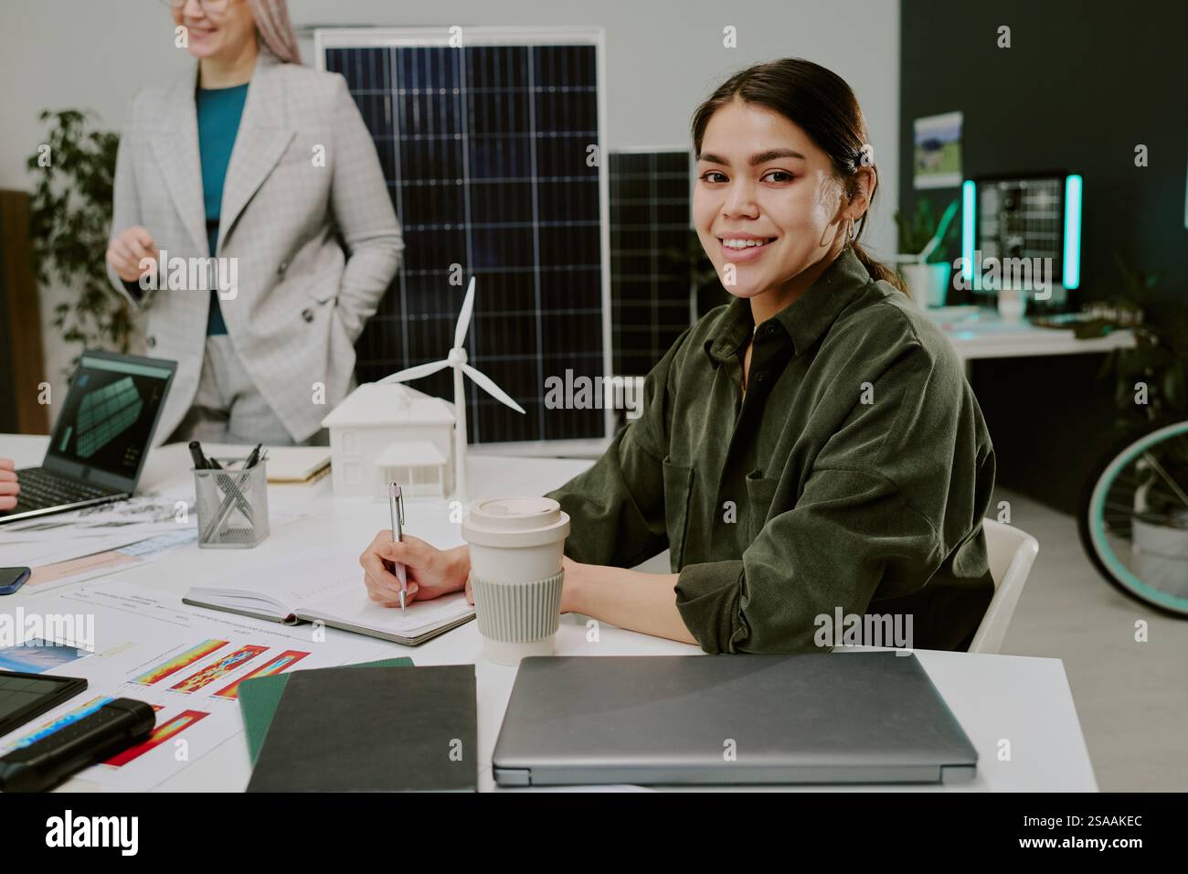 Collaboration laptop smile designer hi-res stock photography and images ...