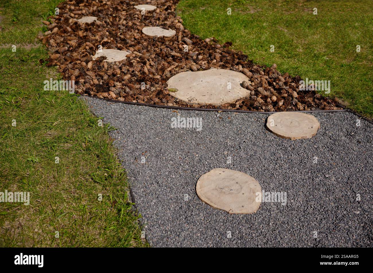 Tactile eco-trail in city park with different textures for walking ...