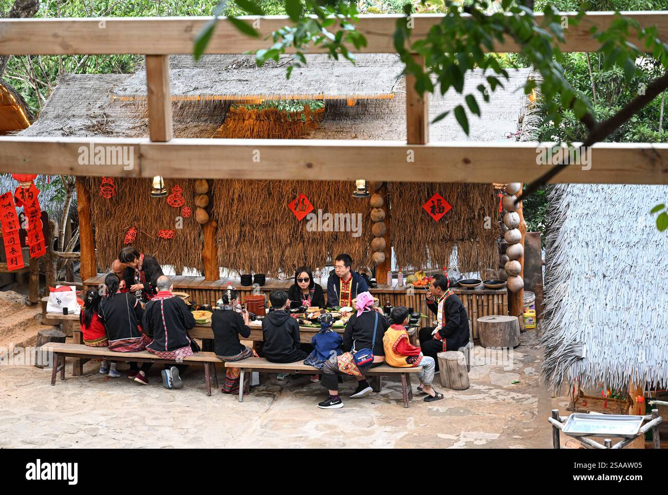 Baoting, China's Hainan Province. 28th Jan, 2025. Tourists enjoy a ...