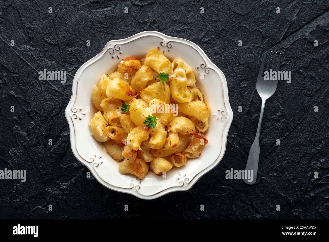 Mac and cheese, the classic pasta with macaroni and Cheddar cheese ...