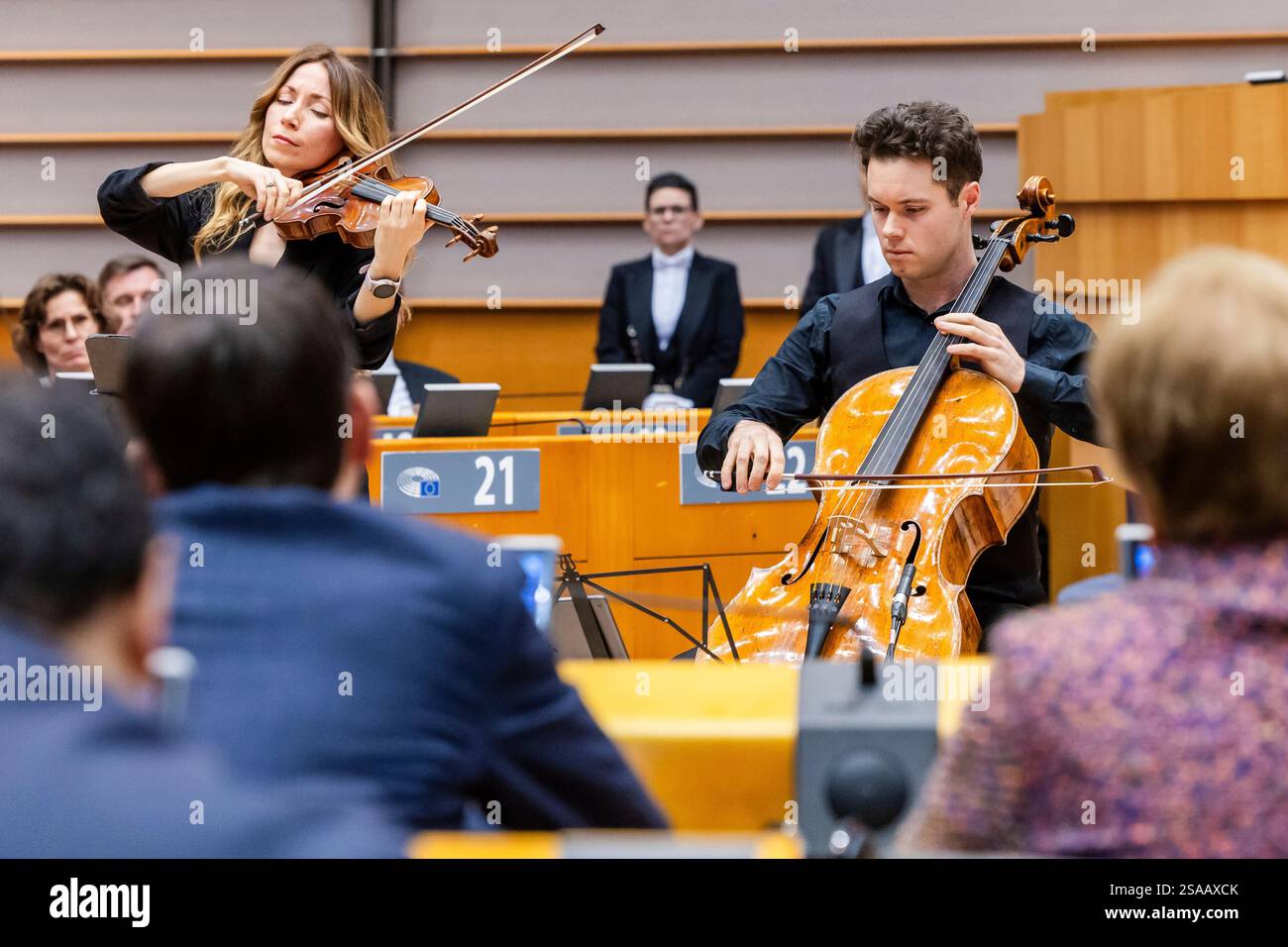 Sam Lucas, right, plays the cello of Pal Hermann, who was a victim of ...