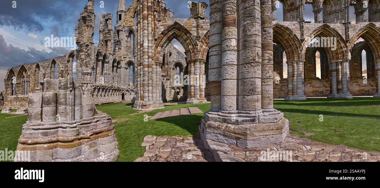 Gothic columns of the picturesque ruins of Whitby Abbey, North ...