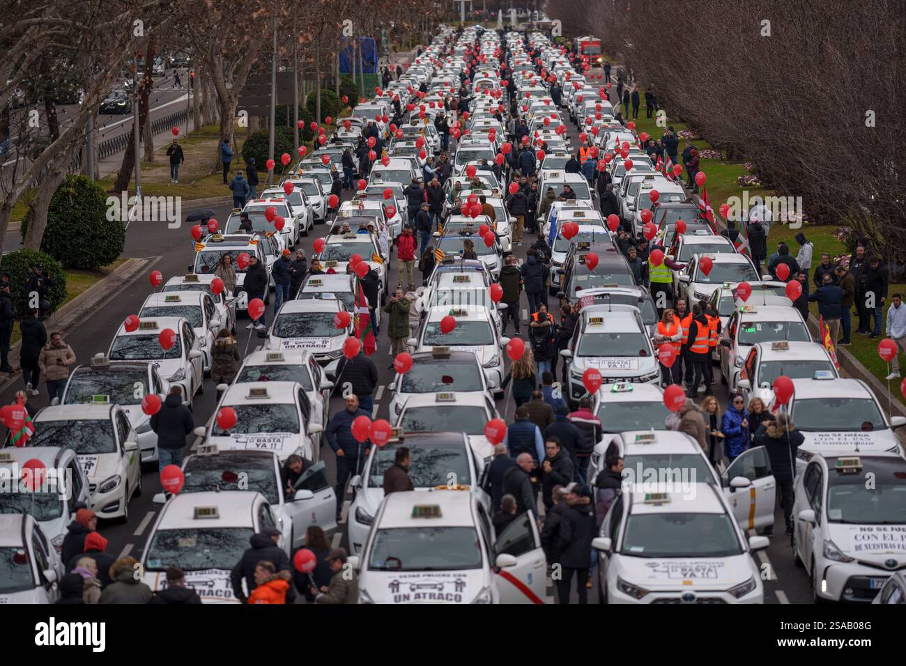 Taxi drivers block traffic on one of Madrid's main avenues during a ...