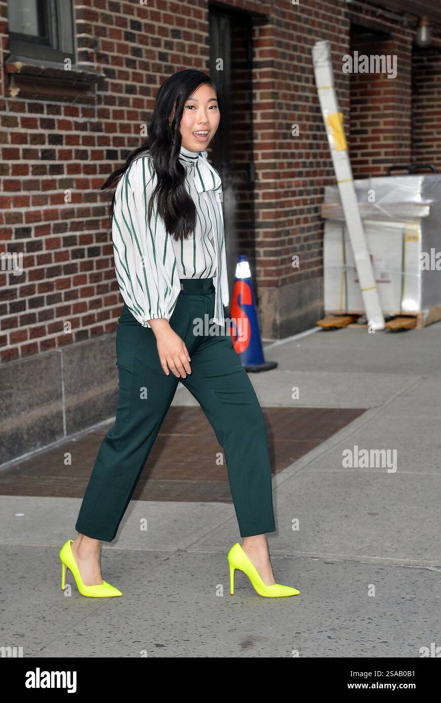 Nora Lum, known professionally as Awkwafina at the 'The Late Show with ...
