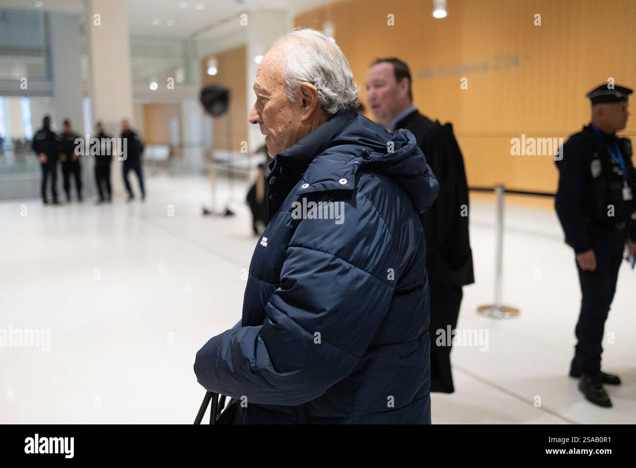 Thierry Gaubert arrives for his hearing in his trial with twelve other ...
