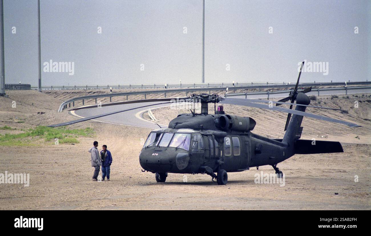 First Gulf War: 23rd March 1991 Iraqi children stand next to a U.S ...