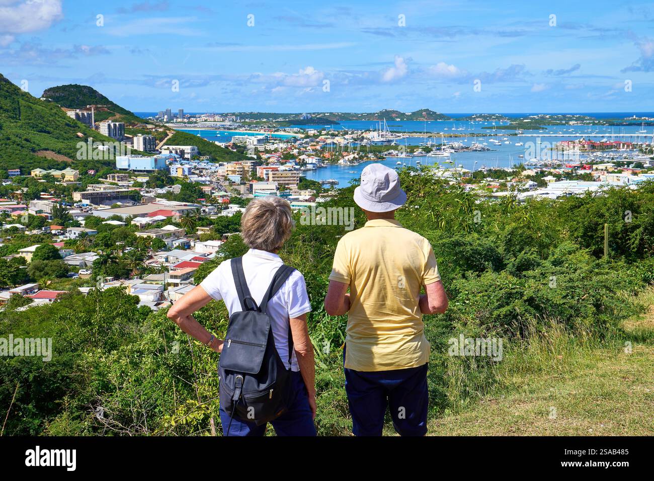 Sint Maarten, Caribbean - January 3, 2025: An elderly couple enjoys the ...