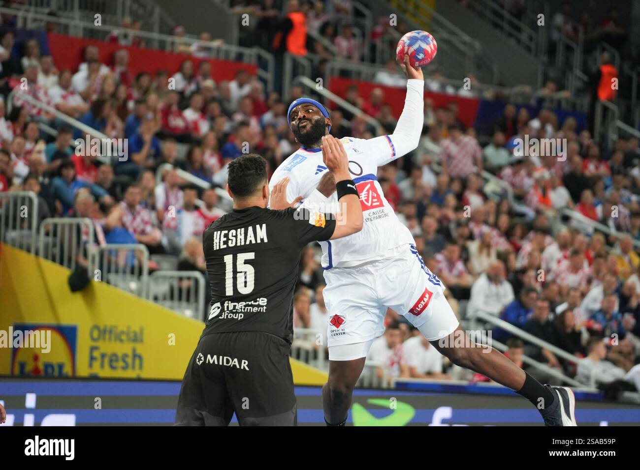 Zagreb, Croatie. 28th Jan, 2025. Dika Mem of France, Ahmed Hesham of Egypt during the IHF Men's ...